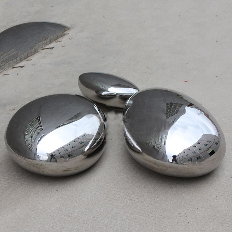 Stainless steel sculpture pebbles are handcrafted by skilled artisans